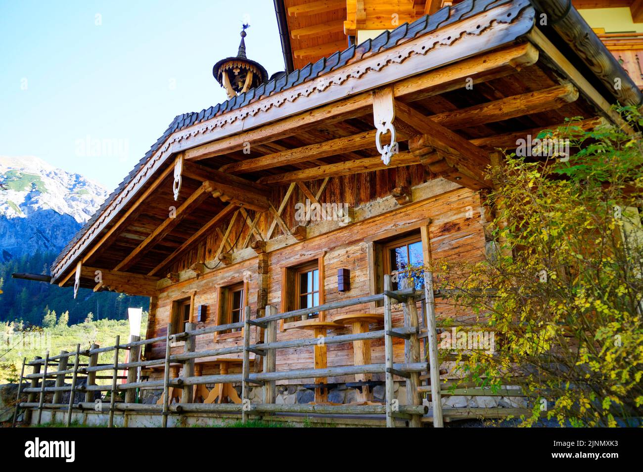 a traditional wooden house in the Gramai Alm region in the Alps in ...