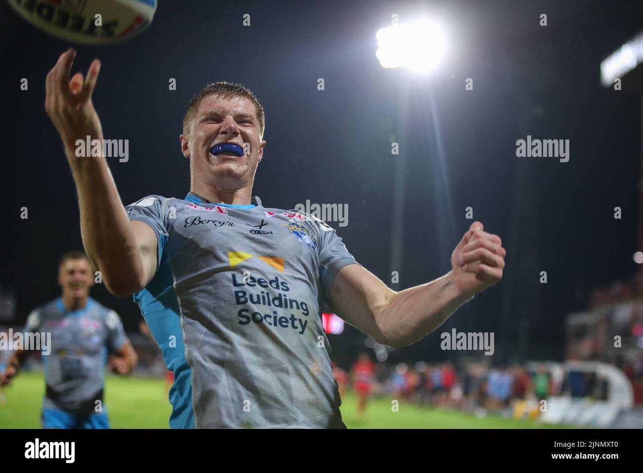 Morgan Gannon #21 of Leeds Rhinos celebrates his try in, on 8/12/2022 ...