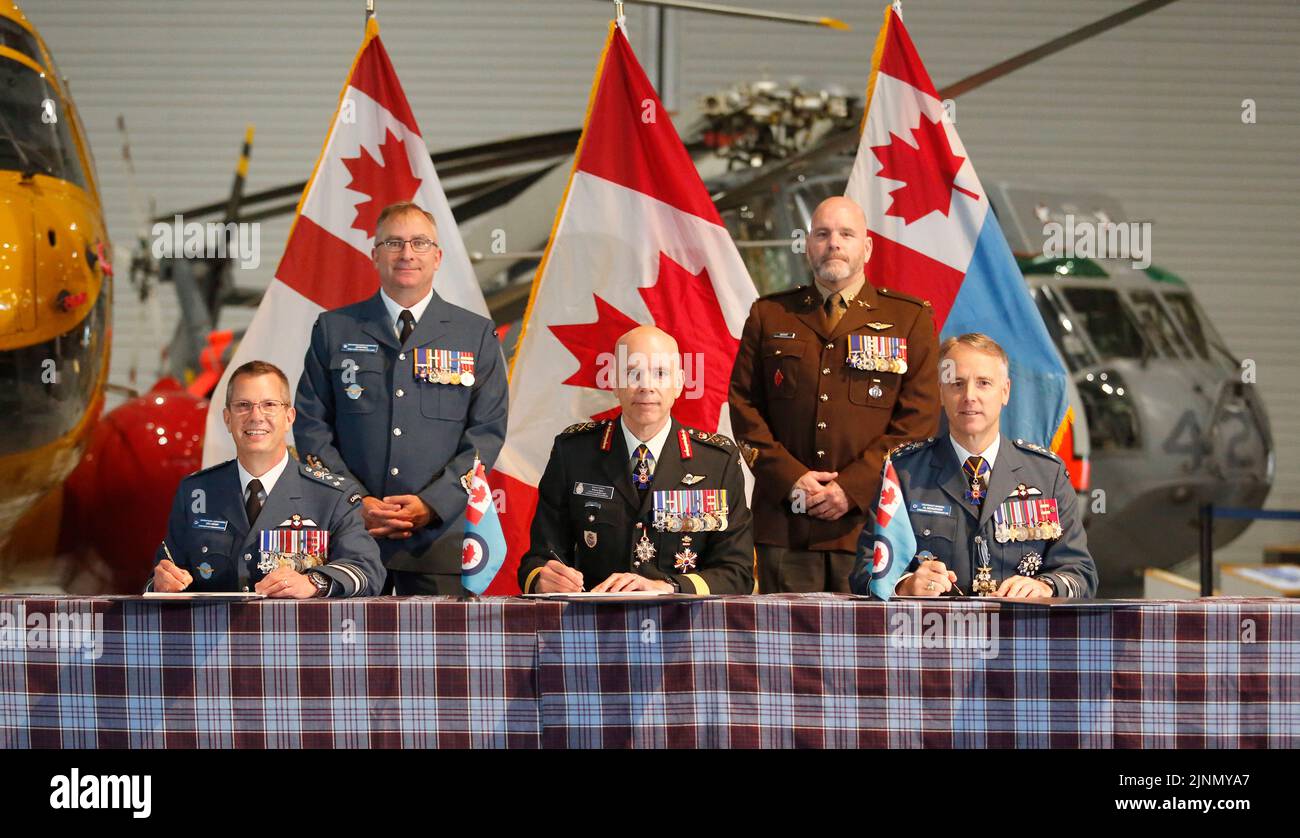 Outgoing RCAF Commander Lieutenant-General Al Meinzinger, front right ...