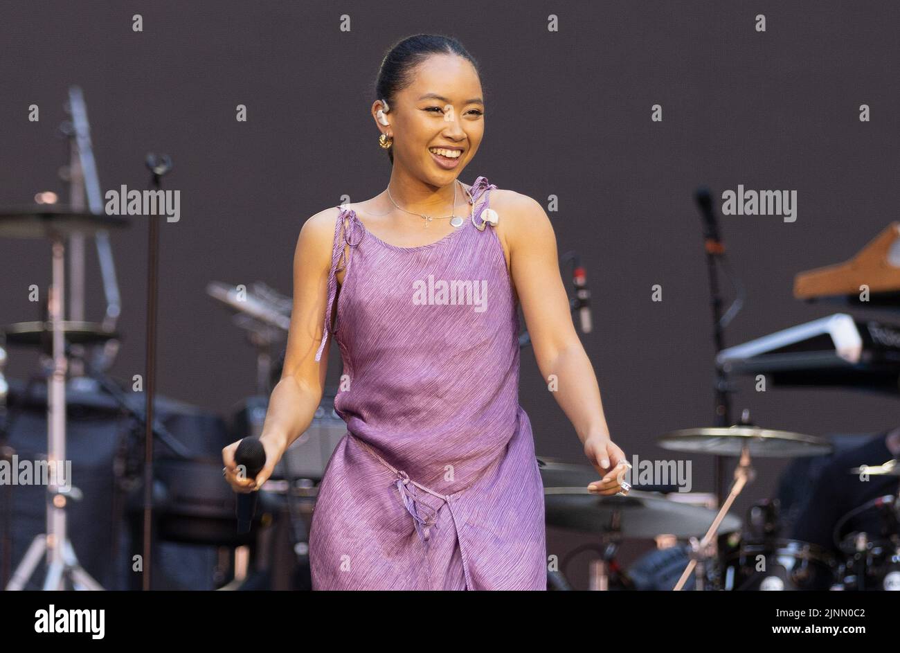 Griff performing on stage ahead of the headline act Coldplay, at ...