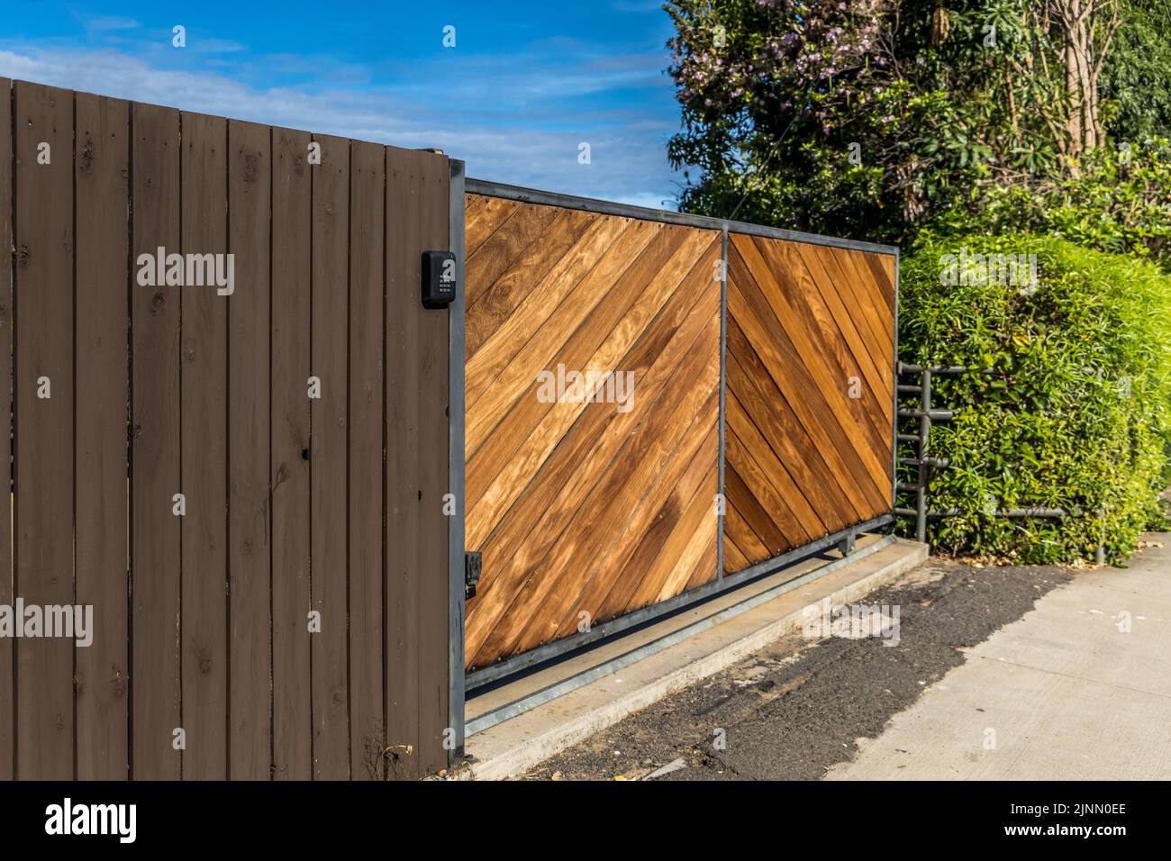 Stained natural wood modern and clean wood driveway property private ...