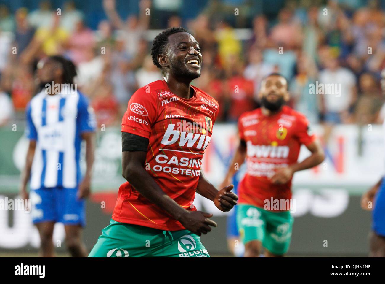 Oostende, Belgium. 12th Aug, 2022. Oostende's David Atanga celebrates ...