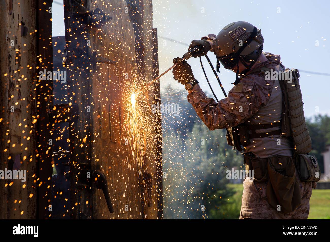 U.S. Marines and airmen attached to the Method of Entry School, Weapons ...