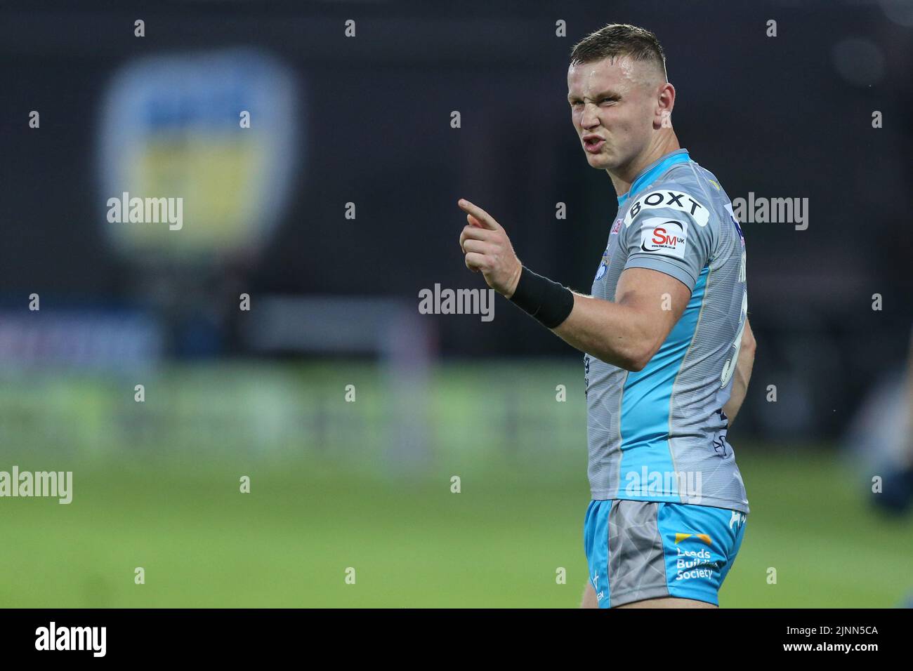 Harry Newman #3 of Leeds Rhinos gestures to his team mate Stock Photo ...