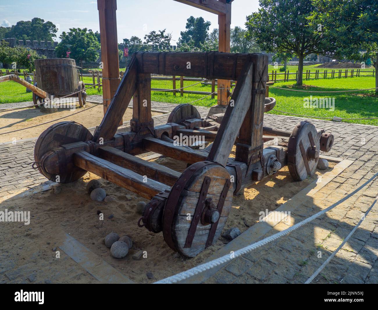 Museum piece. Wooden catapult. Catapult in the ruins of an old building ...