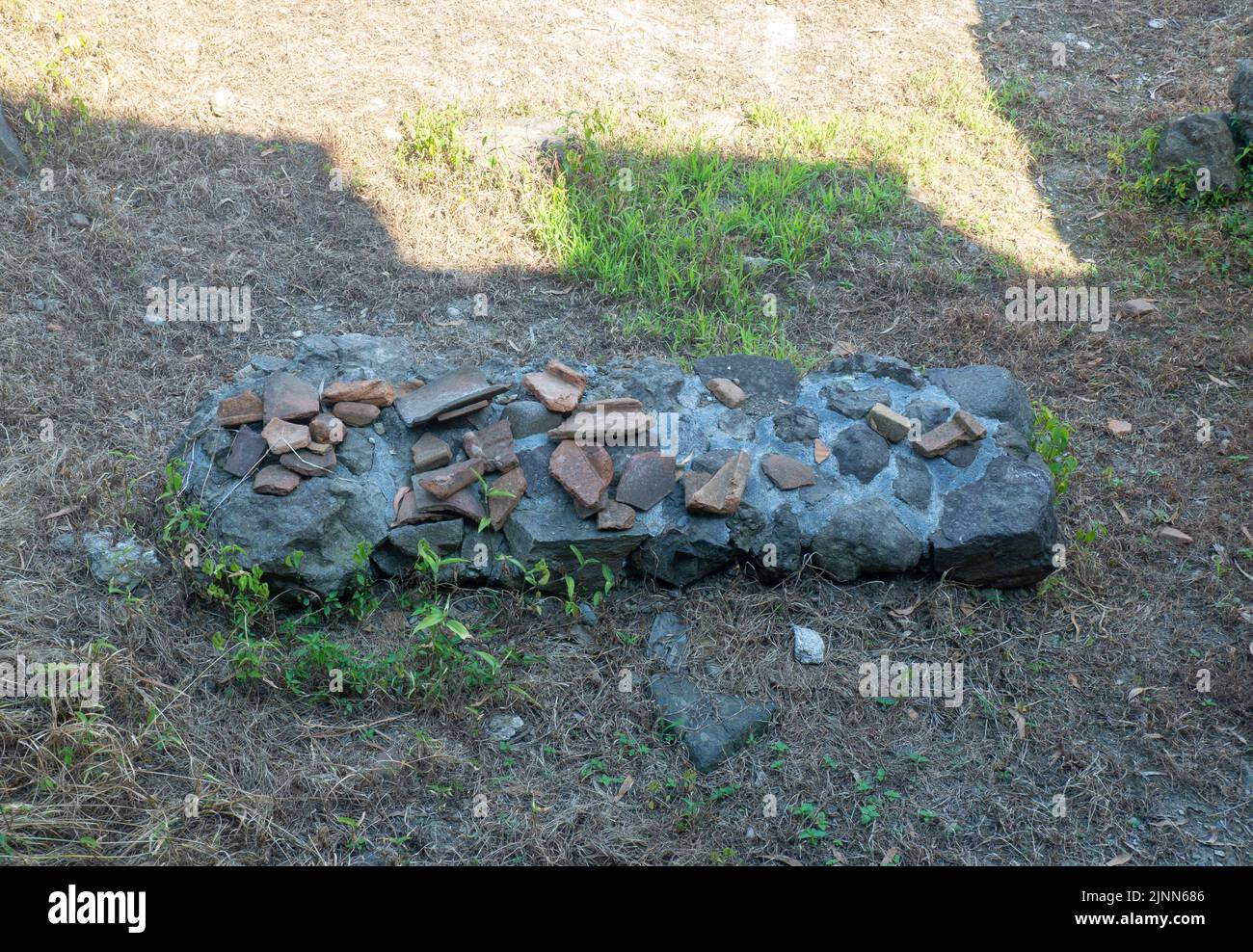 Remains of ancient pottery. Shards from old crockery. Ruins of an ...
