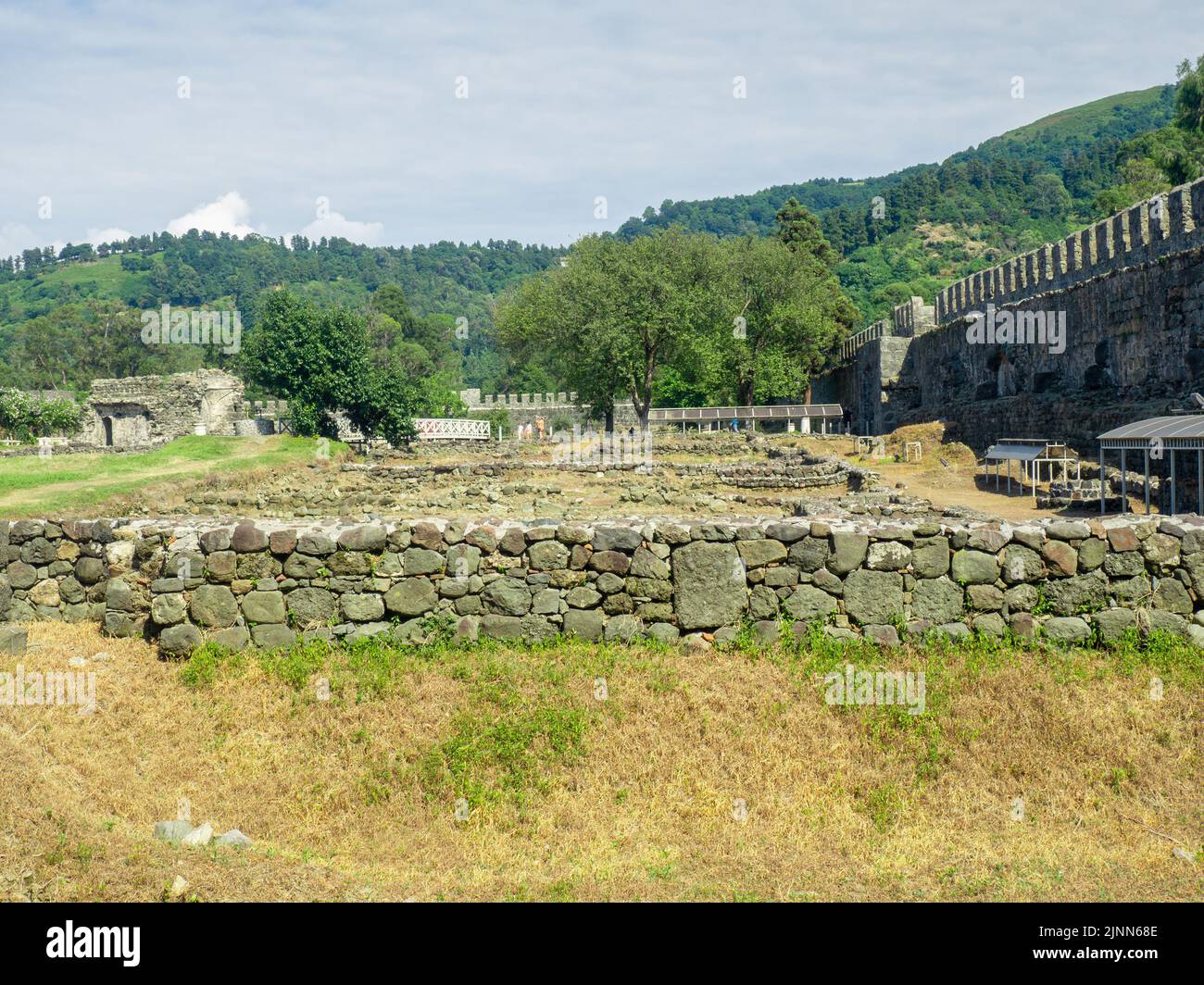 The foundation of an ancient building. Archeology. Ruins of an ancient ...