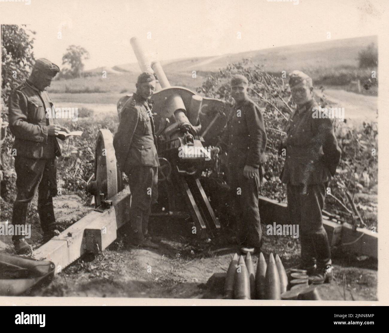 World War Two B&W photo German Light Field Howitzer in Position on the ...