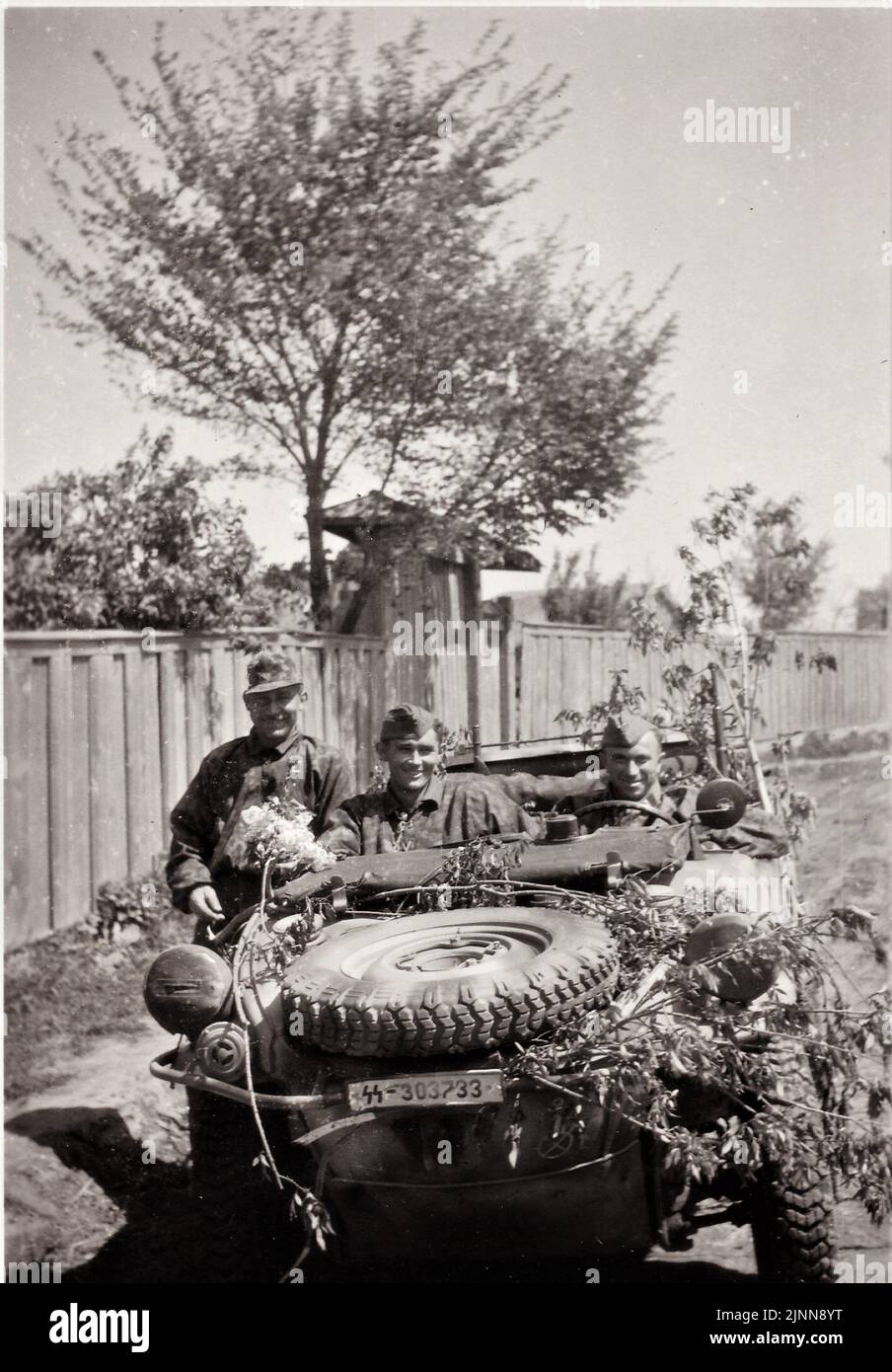 Wehrmacht troops in a Camouflaged Schwimmwagen VW166 in 1944 on the ...