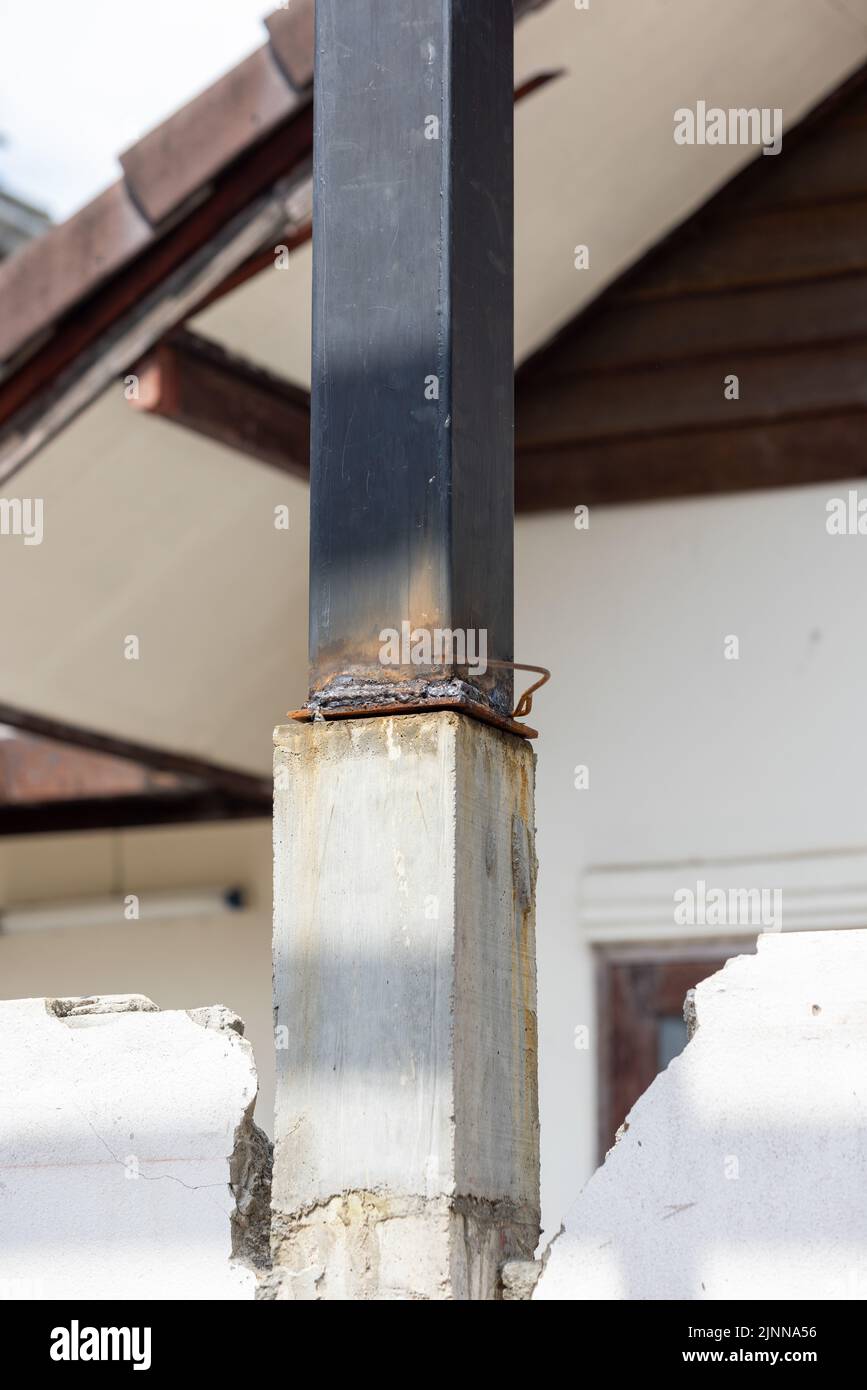Height extension concrete column by square steel pipe Stock Photo - Alamy