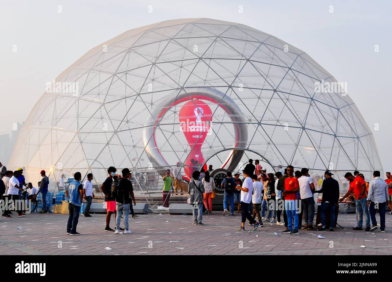 Doha, Qatar. 12th Aug, 2022. People visit the 100-day countdown clock ...