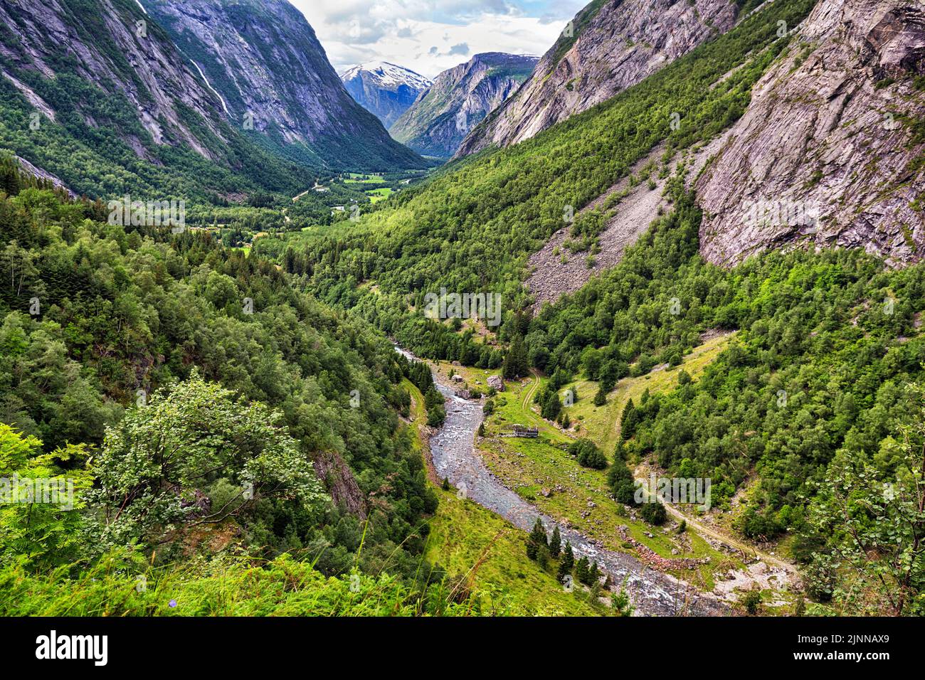 View from above of the forested valley Eikesdalen, high mountains and ...