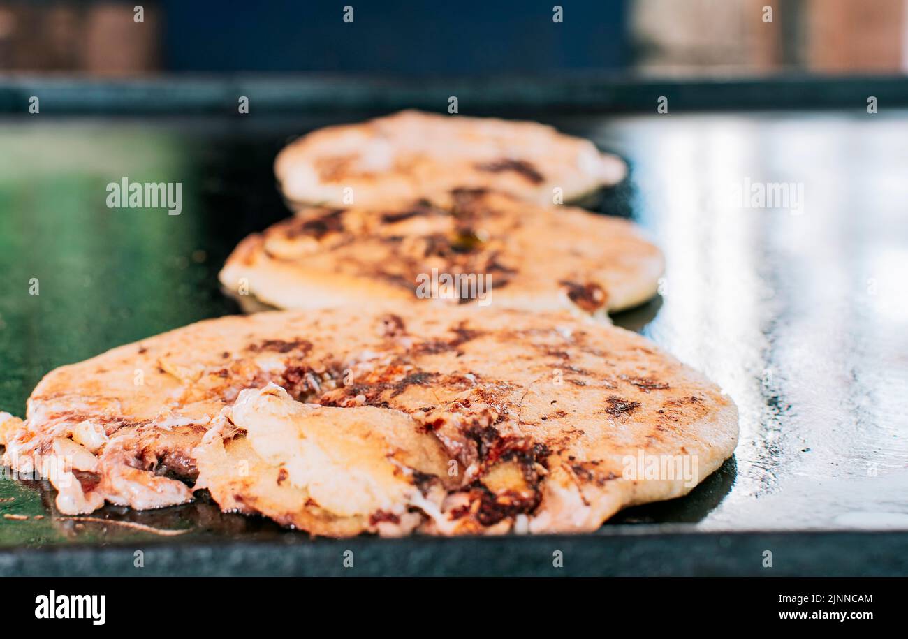Traditional Nicaraguan pupusas with melted grilled cheese, Traditional ...