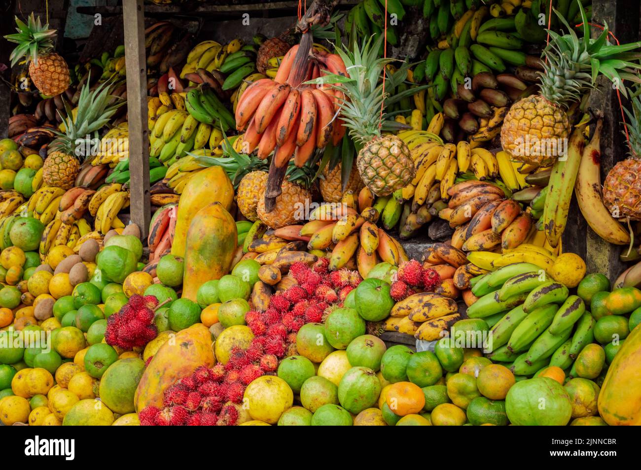 A traditional fresh fruit stall, concept of assorted fruits and healthy ...