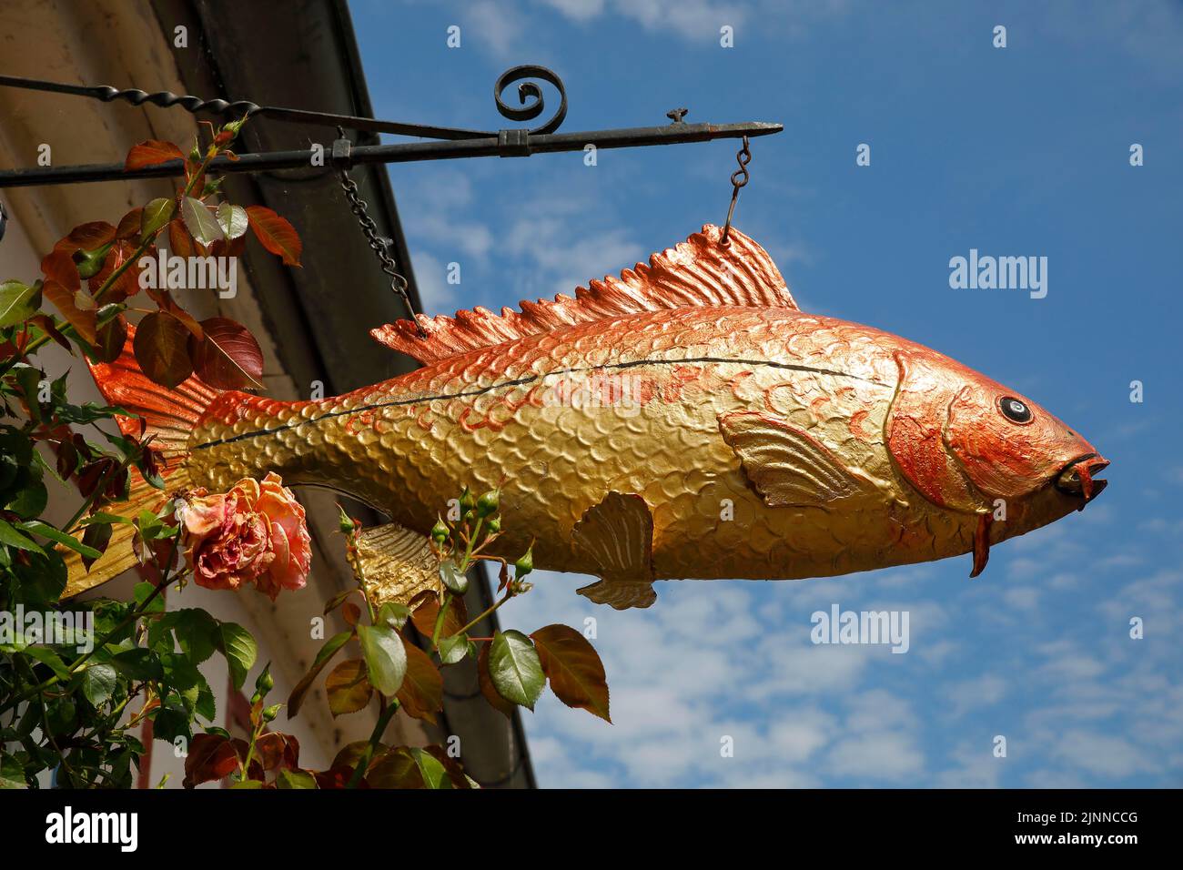 Fish sculpture on an old fisherman's house, Historic fishing village ...