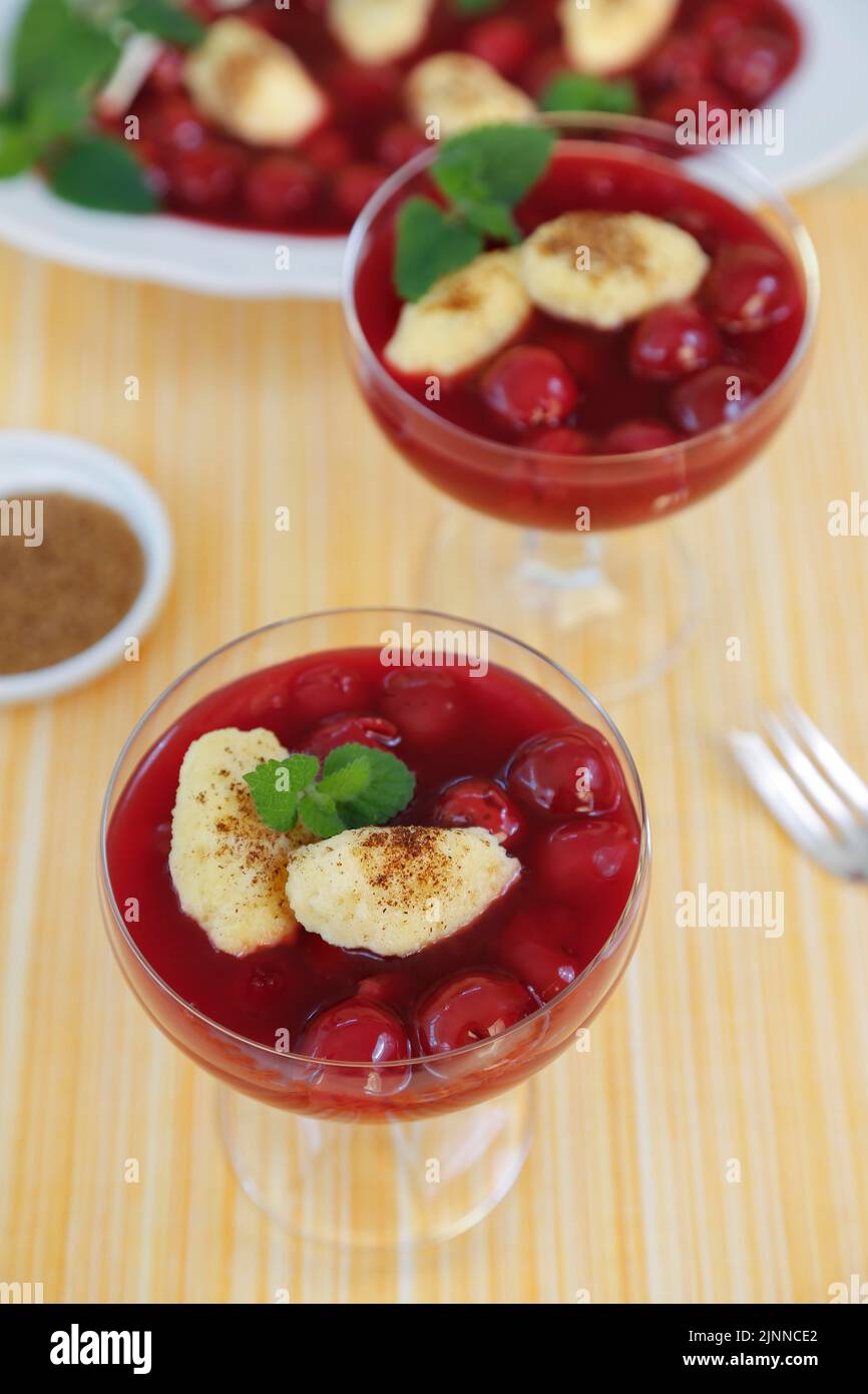 Swabian cuisine, sweet semolina dumplings with cherry compote, dessert ...