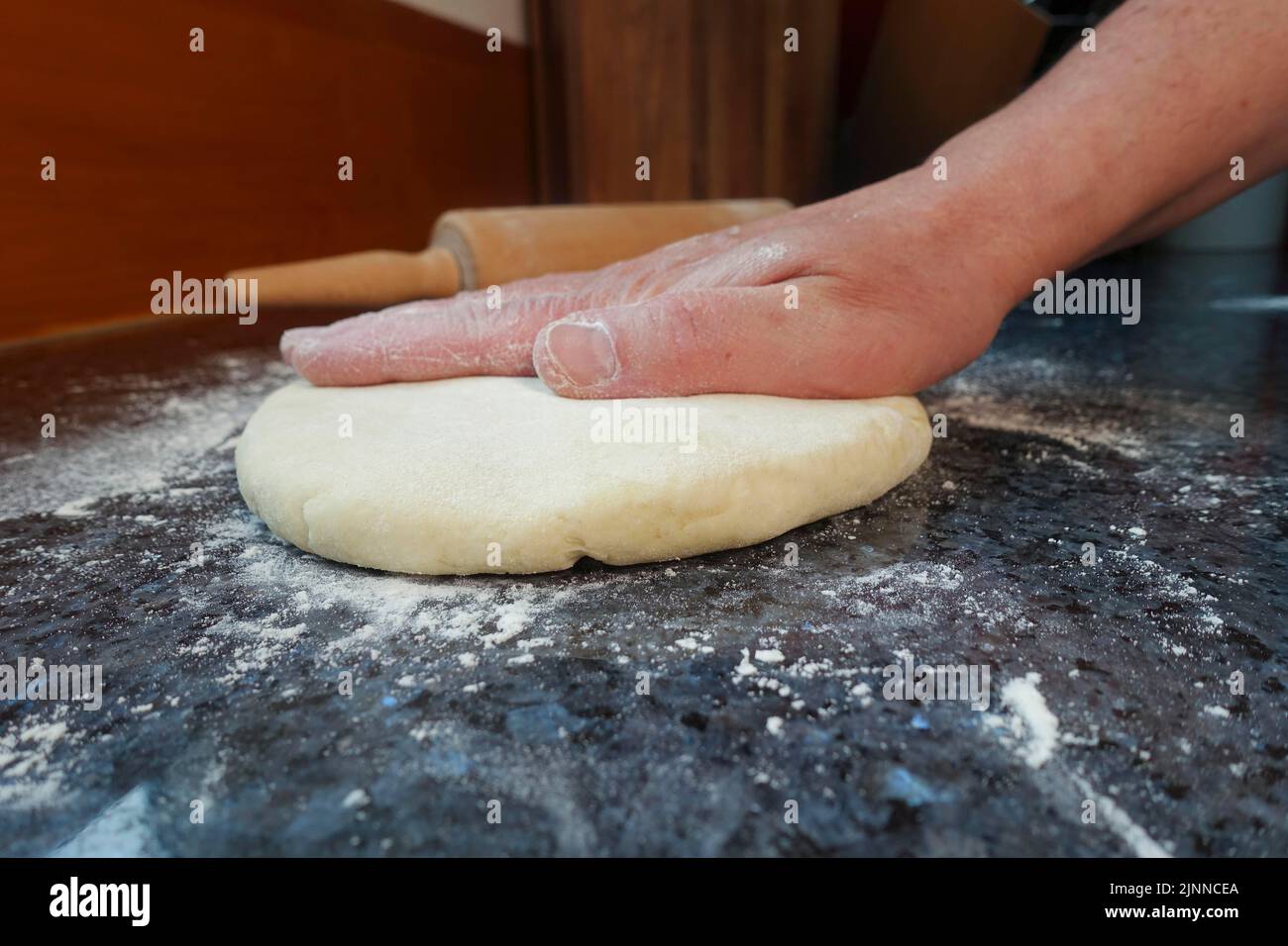 Swabian cuisine, preparing curd dough for Haertsfelder potato cake, savoury cake, flour, bake ...