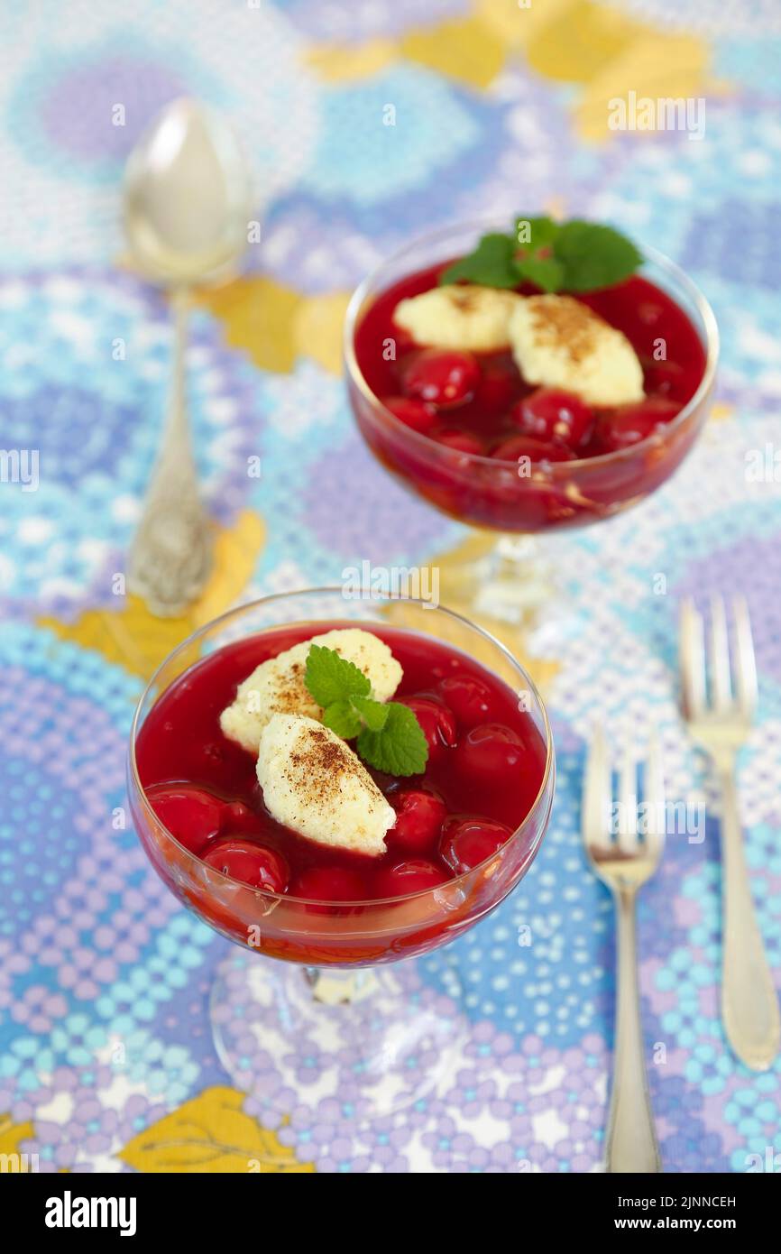 Swabian cuisine, sweet semolina dumplings with cherry compote, dessert ...