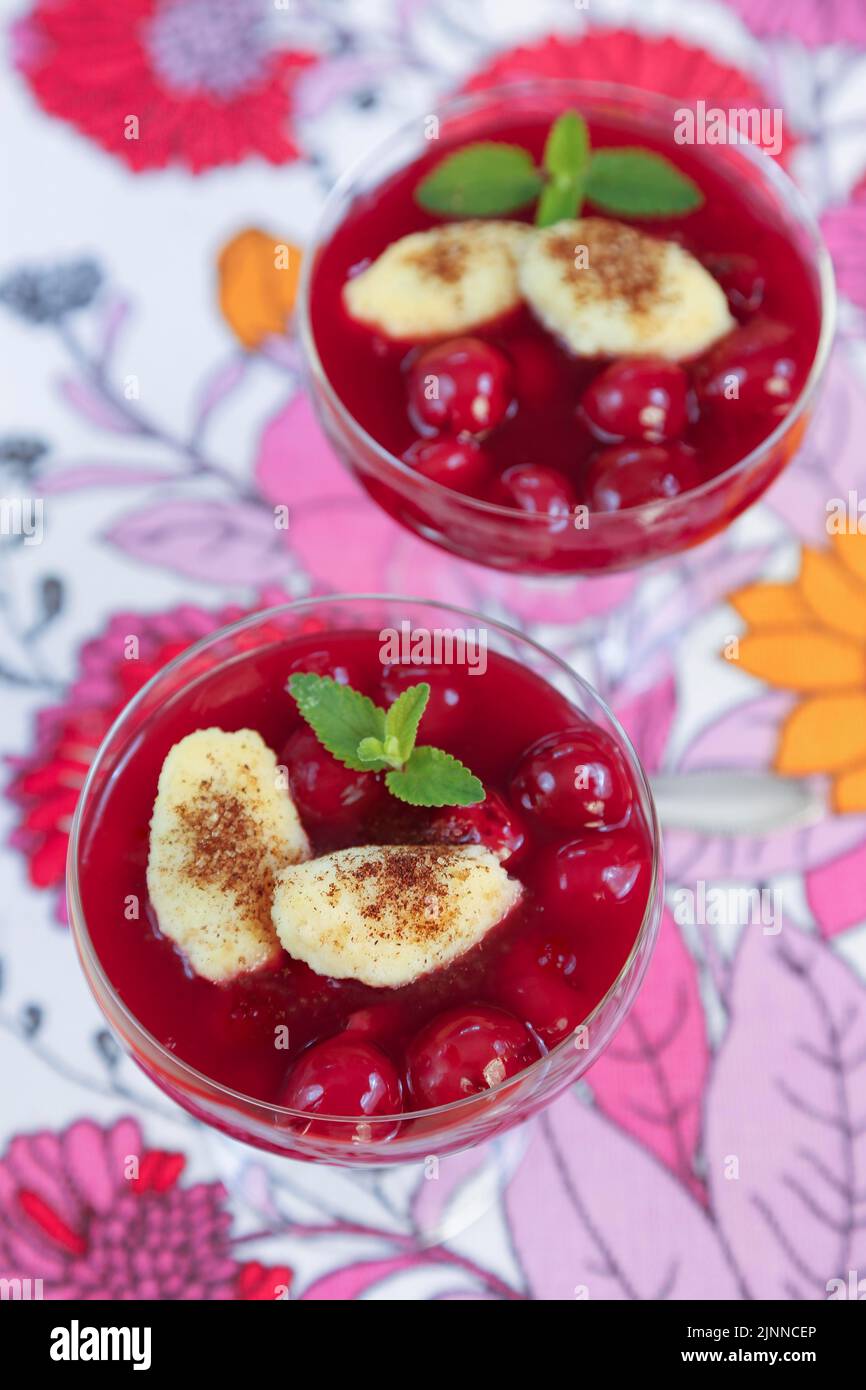 Swabian cuisine, sweet semolina dumplings with cherry compote, dessert ...