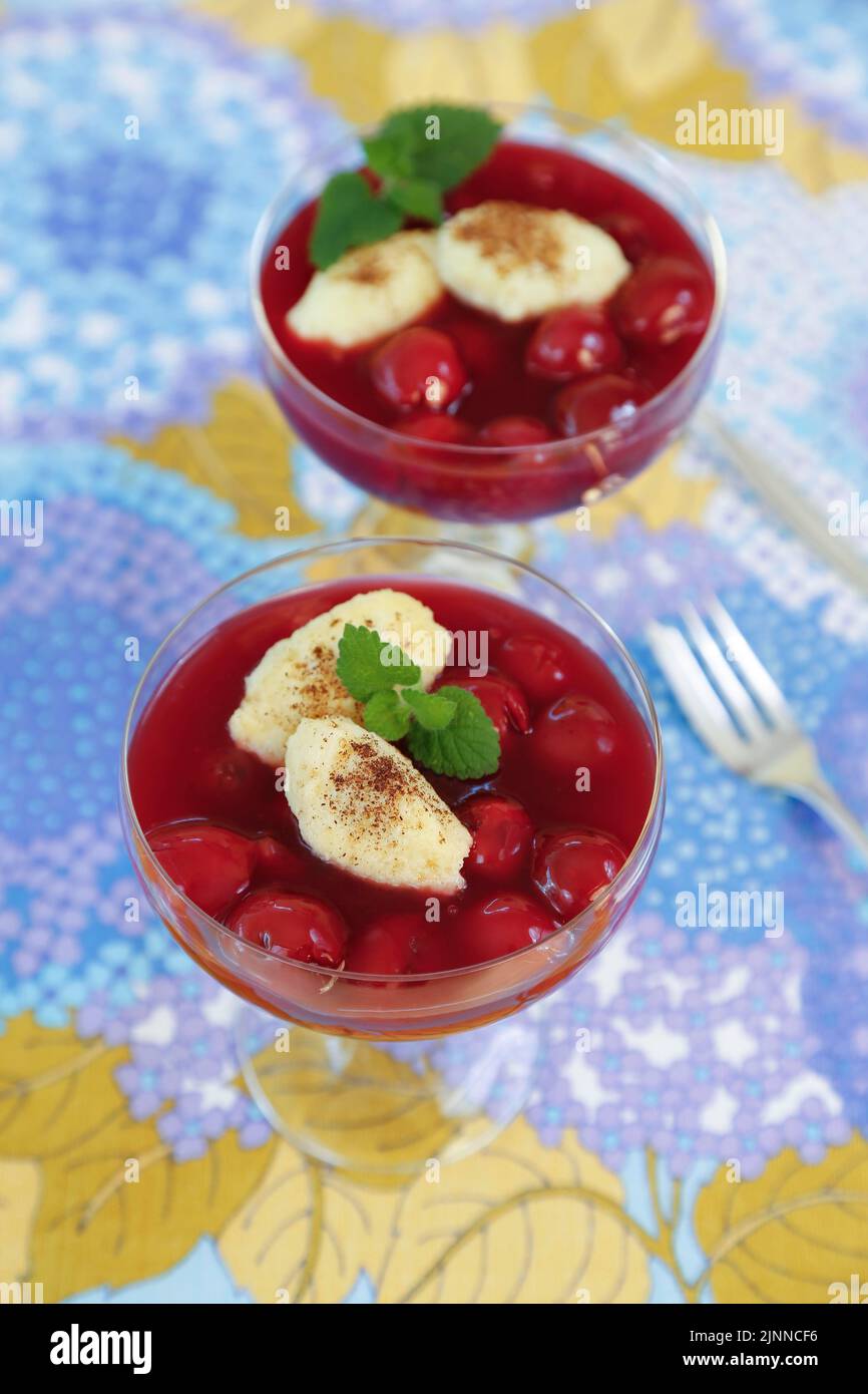 Swabian cuisine, sweet semolina dumplings with cherry compote, dessert ...
