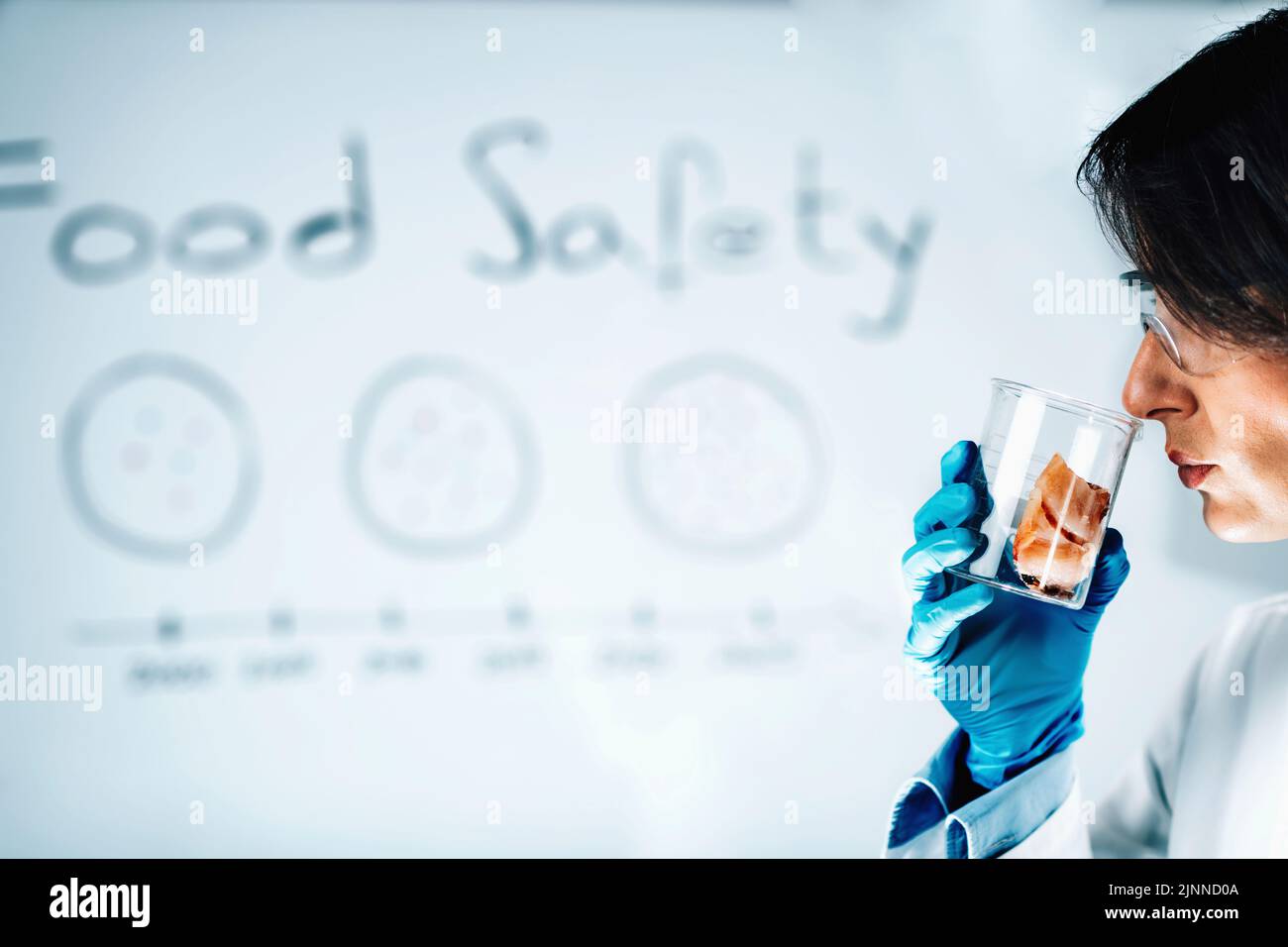 Quality control inspector testing fish Stock Photo - Alamy