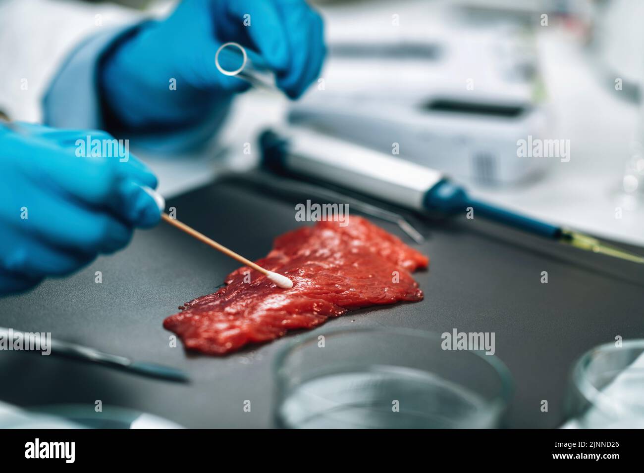 Quality control inspector taking red meat sample Stock Photo - Alamy