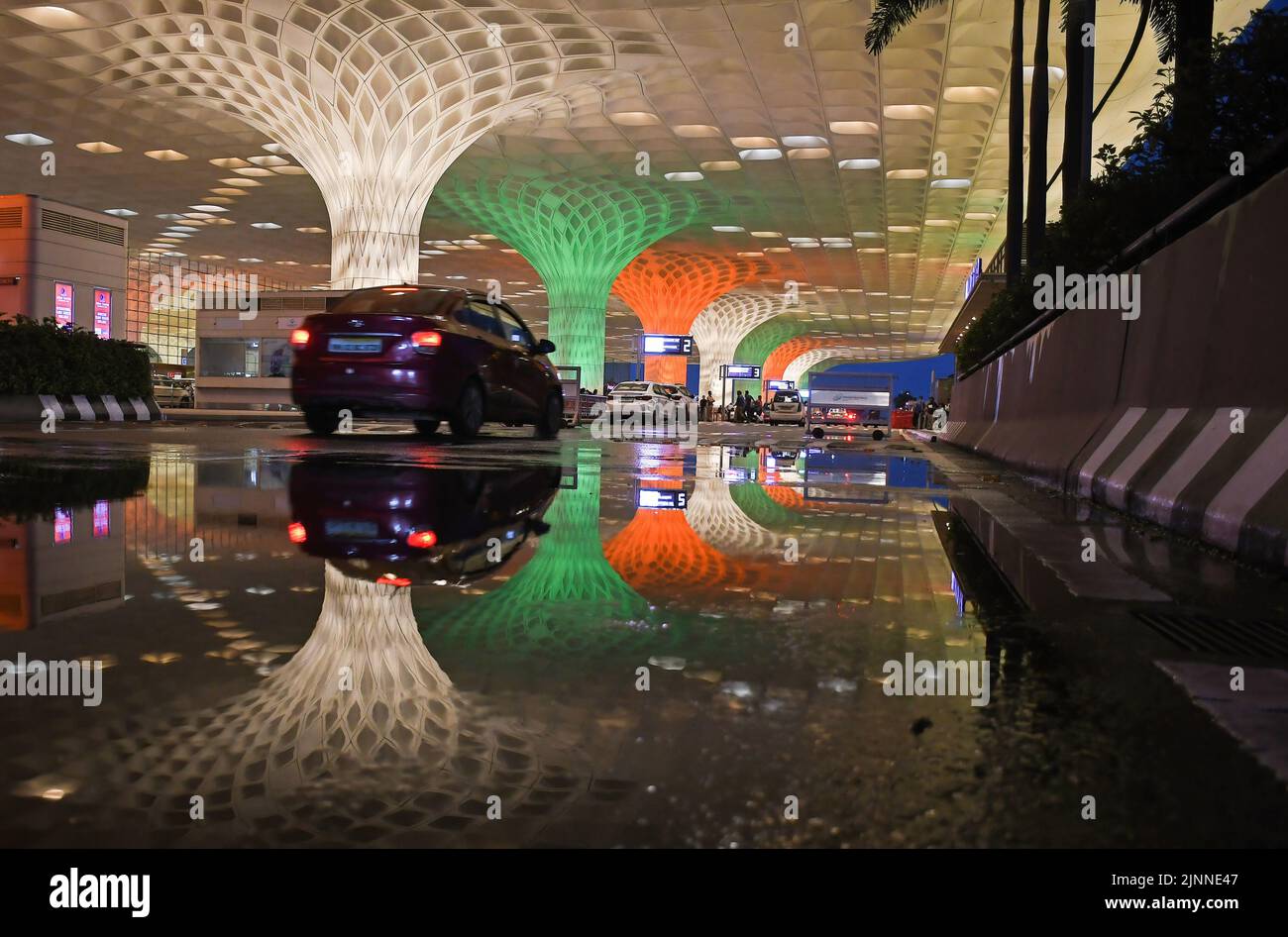 A reflection of light is seen in a puddle at Chhatrapati Shivaji ...