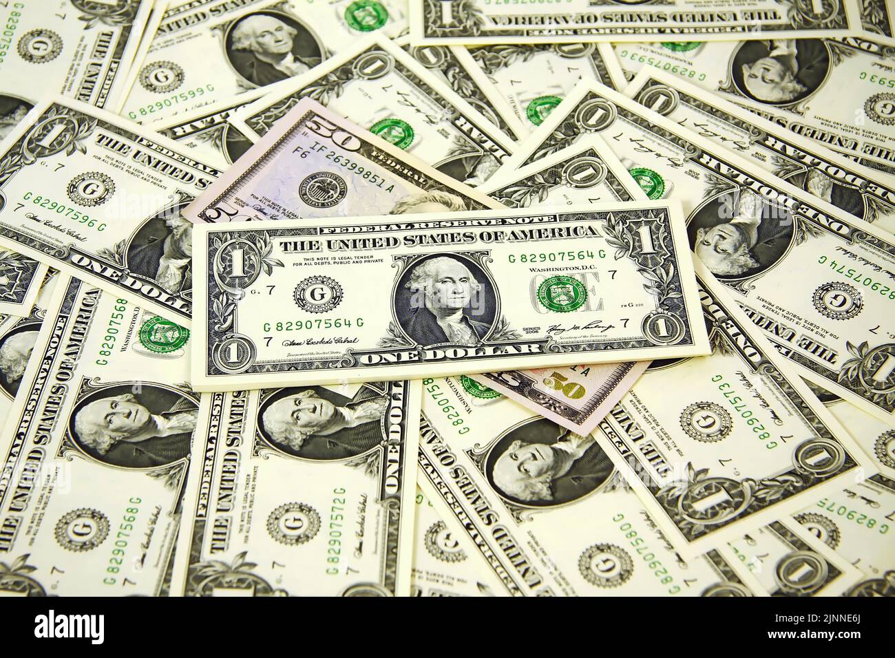 A pile of one dollar notes Stock Photo - Alamy