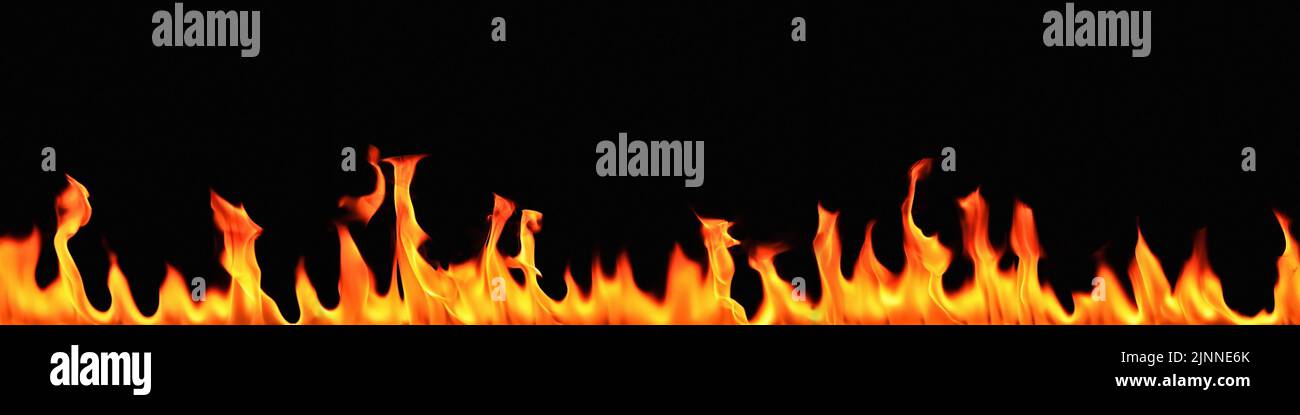 Fire in a flame rail. Ribbon of flame cut out against a black ...