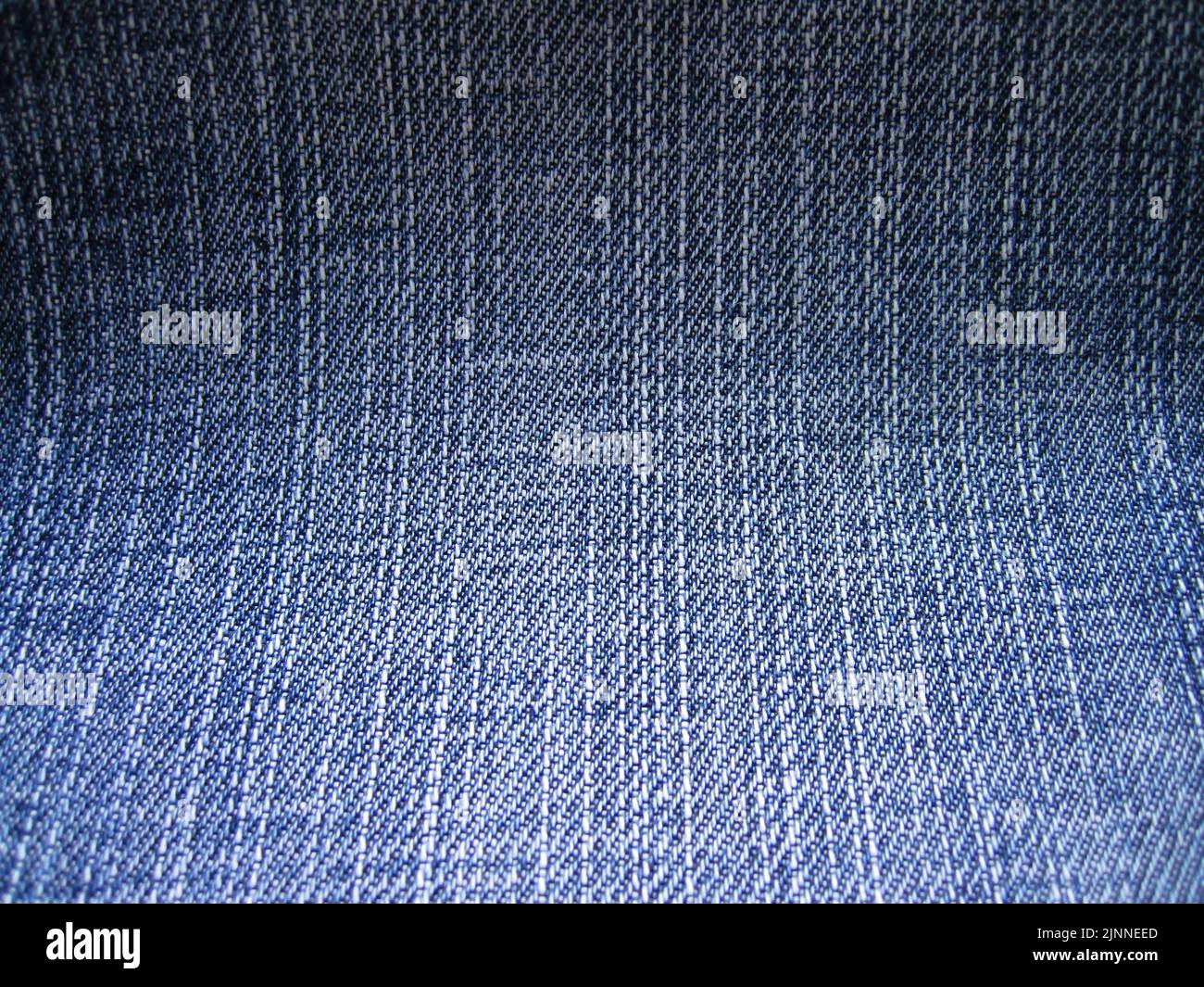 Denim jeans as blue background. Depicted with depth of field to fill ...