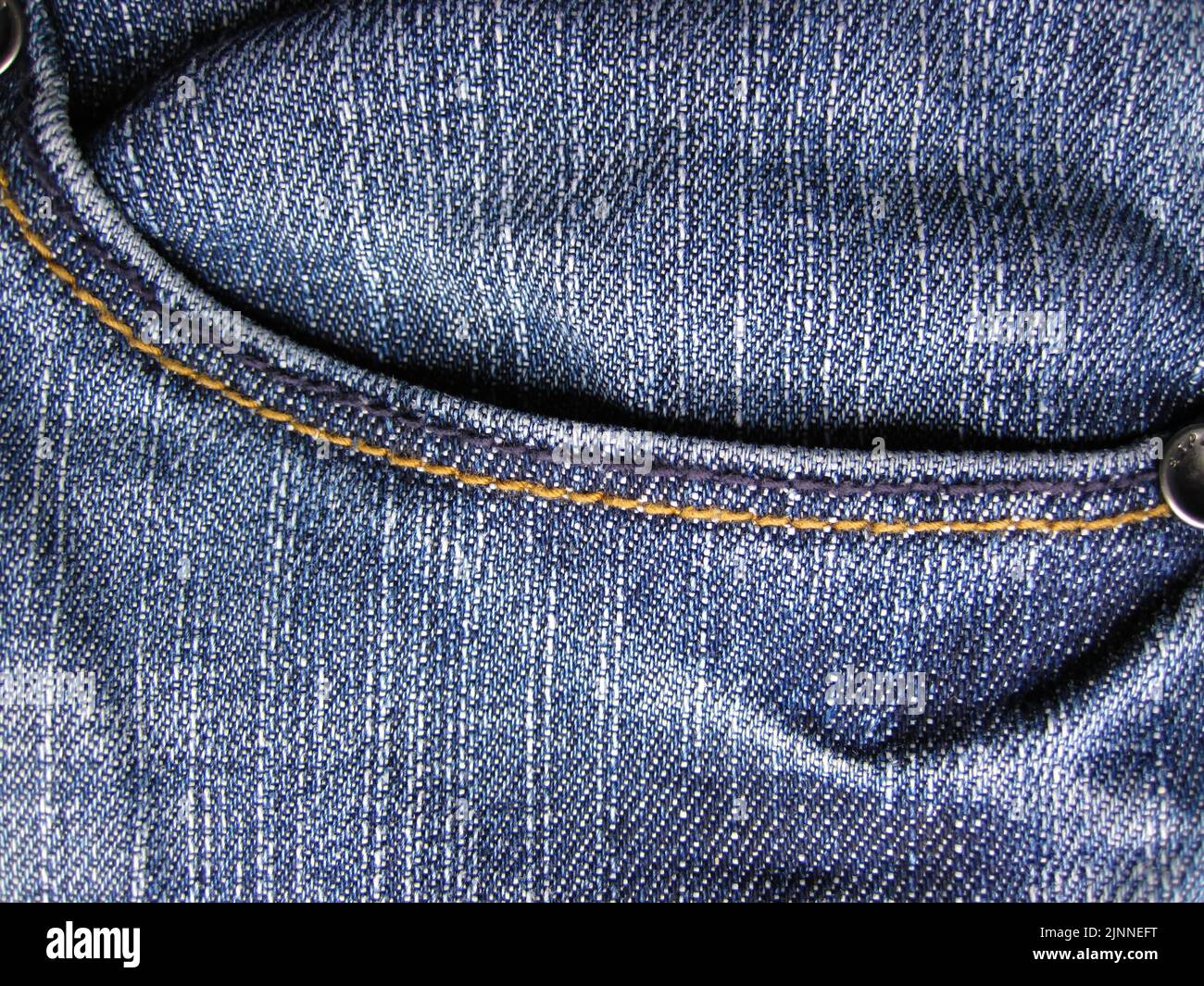 Denim jeans as blue background. With trouser pocket shown in full image ...