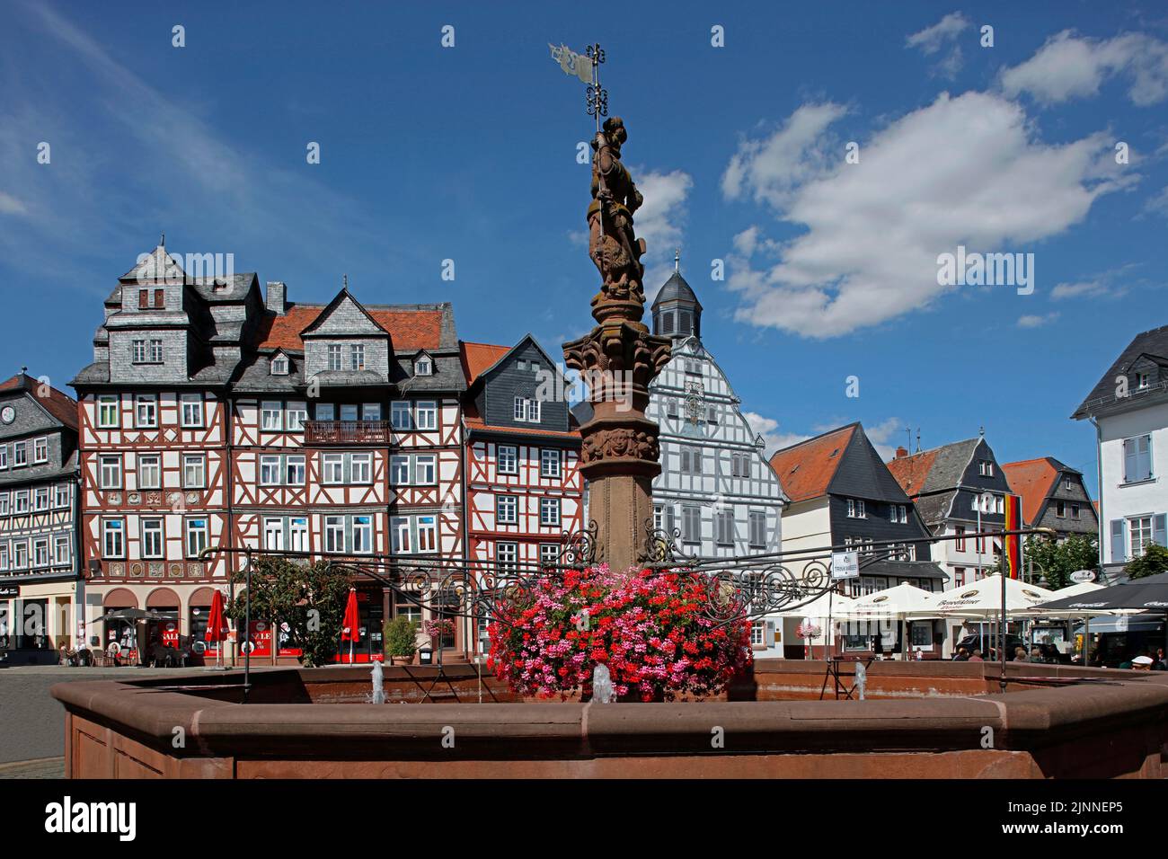Market place. Market fountain, old half-timbered house, 16th century ...