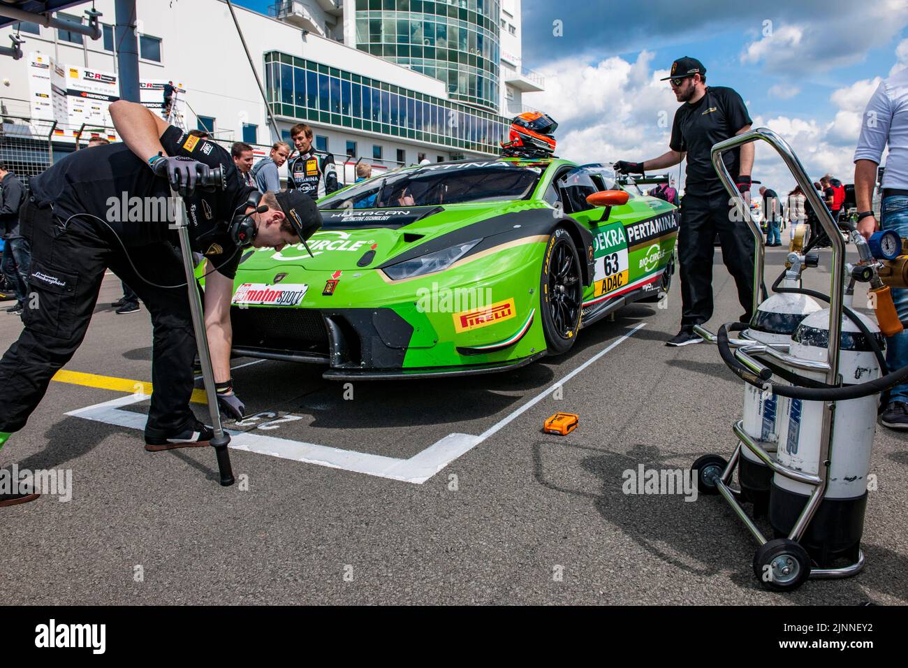 Race team prepares Lamborghini Huracan GT3 race car on start-finish ...