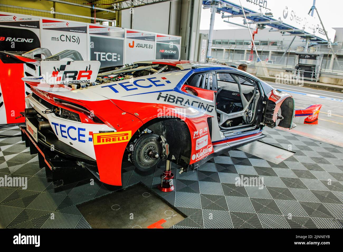 Racing car Lamborghini Huracan GT3 with wheels dismounted without tyres ...
