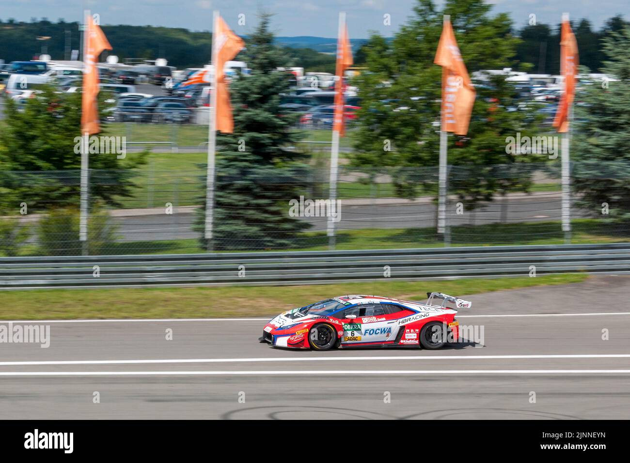 Racing car Lamborghini Huracan GT3 drives at high speed from exit of ...