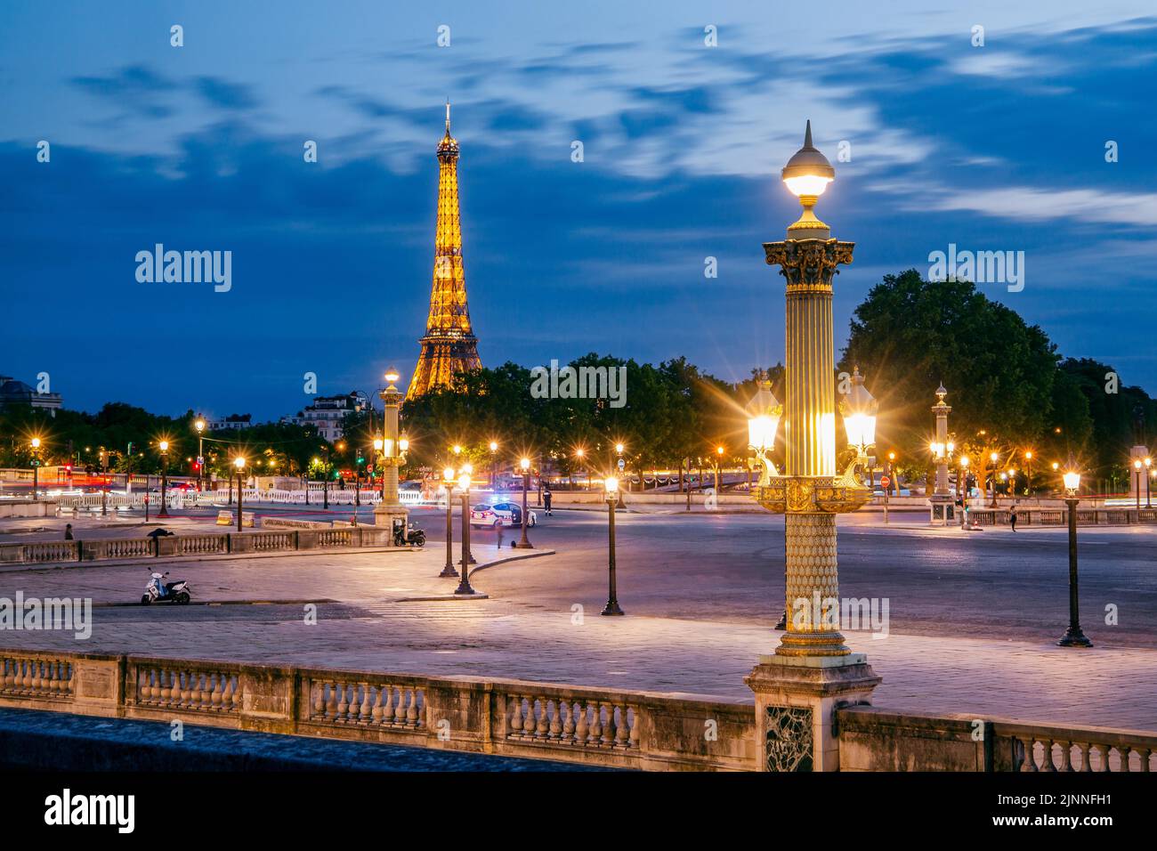 Place de la Concorde with Eiffel Tower at dusk, Paris, Ile de France ...