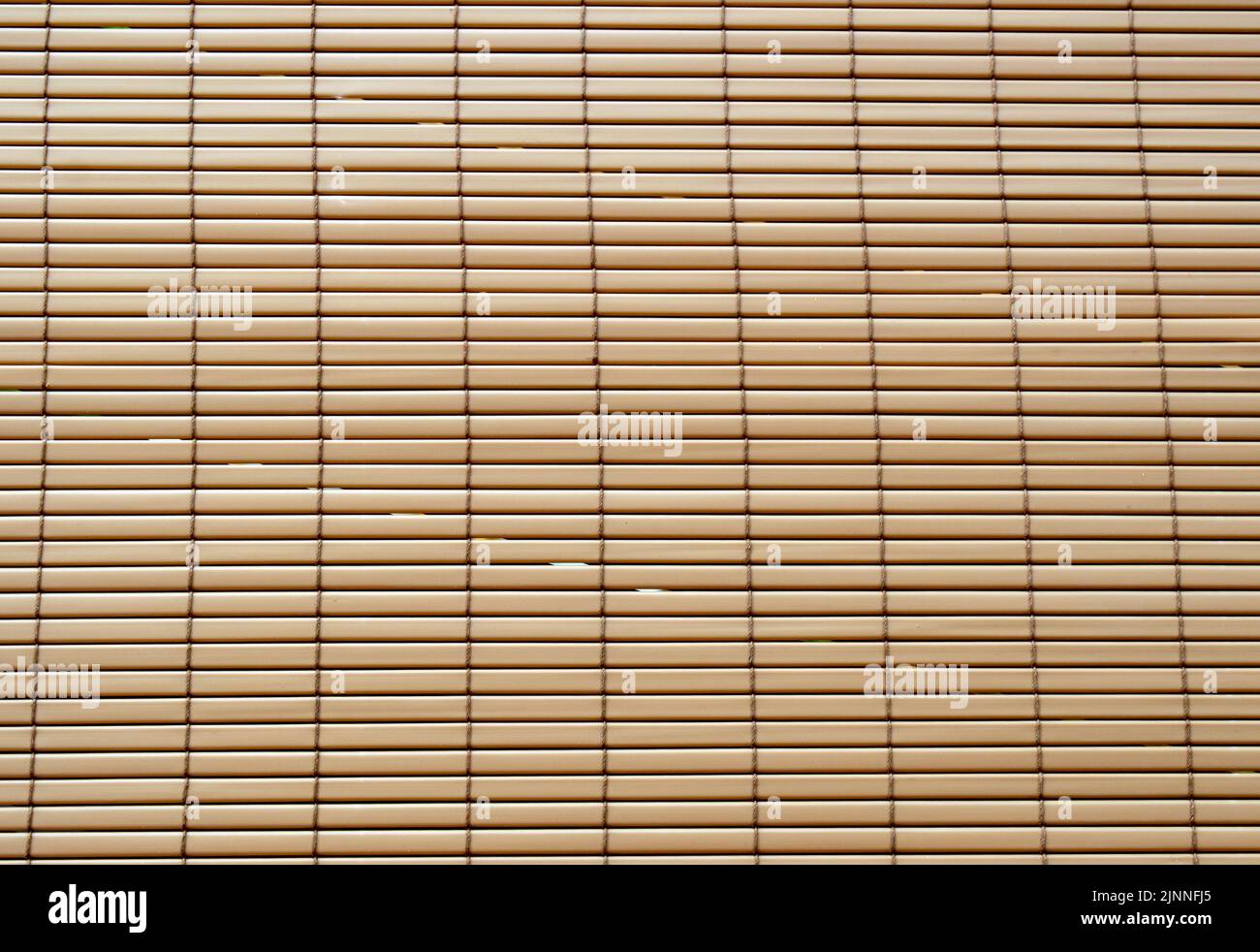 A rolling outdoor shade makes a unique background or texture. Vertical ...