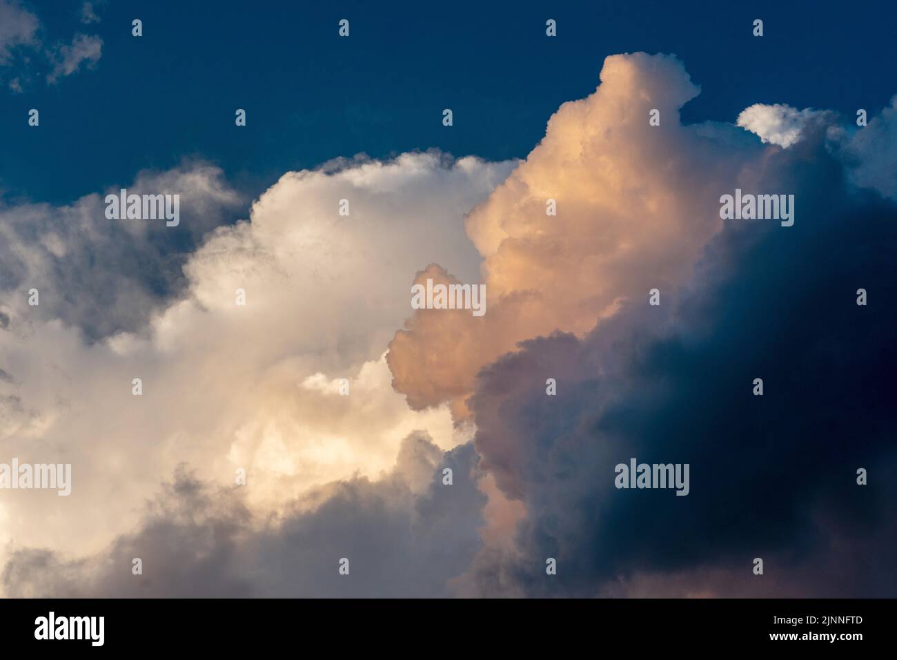 clouds (Cumulus) after the passage of a thunderstorm in different colours Stock Photo - Alamy