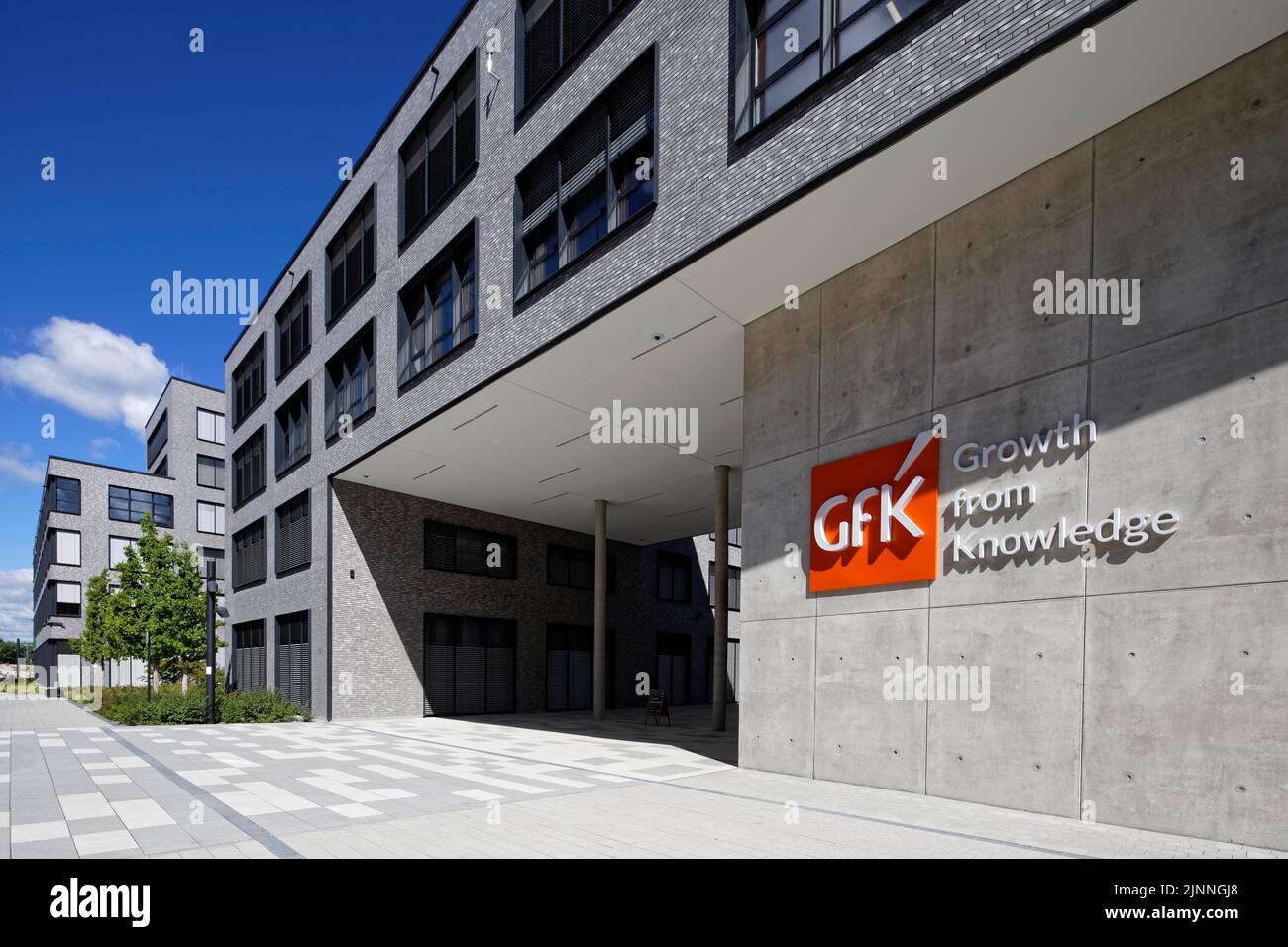 Headquarters, modern GfK building, logo, trademark, brandmark, stands ...