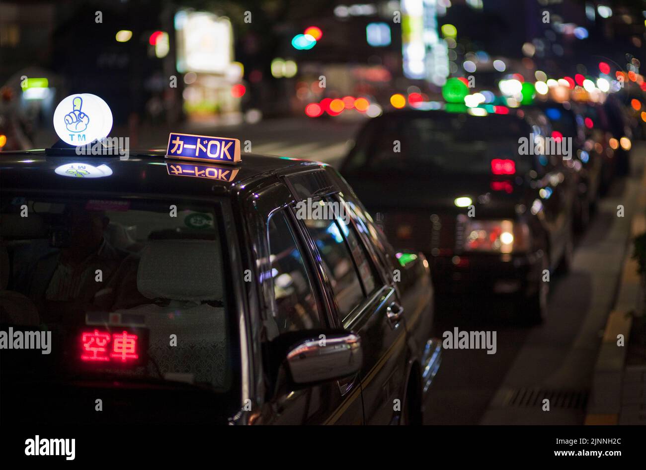 Line of taxis at night at Tokyo Station in Tokyo, Japan Stock Photo - Alamy