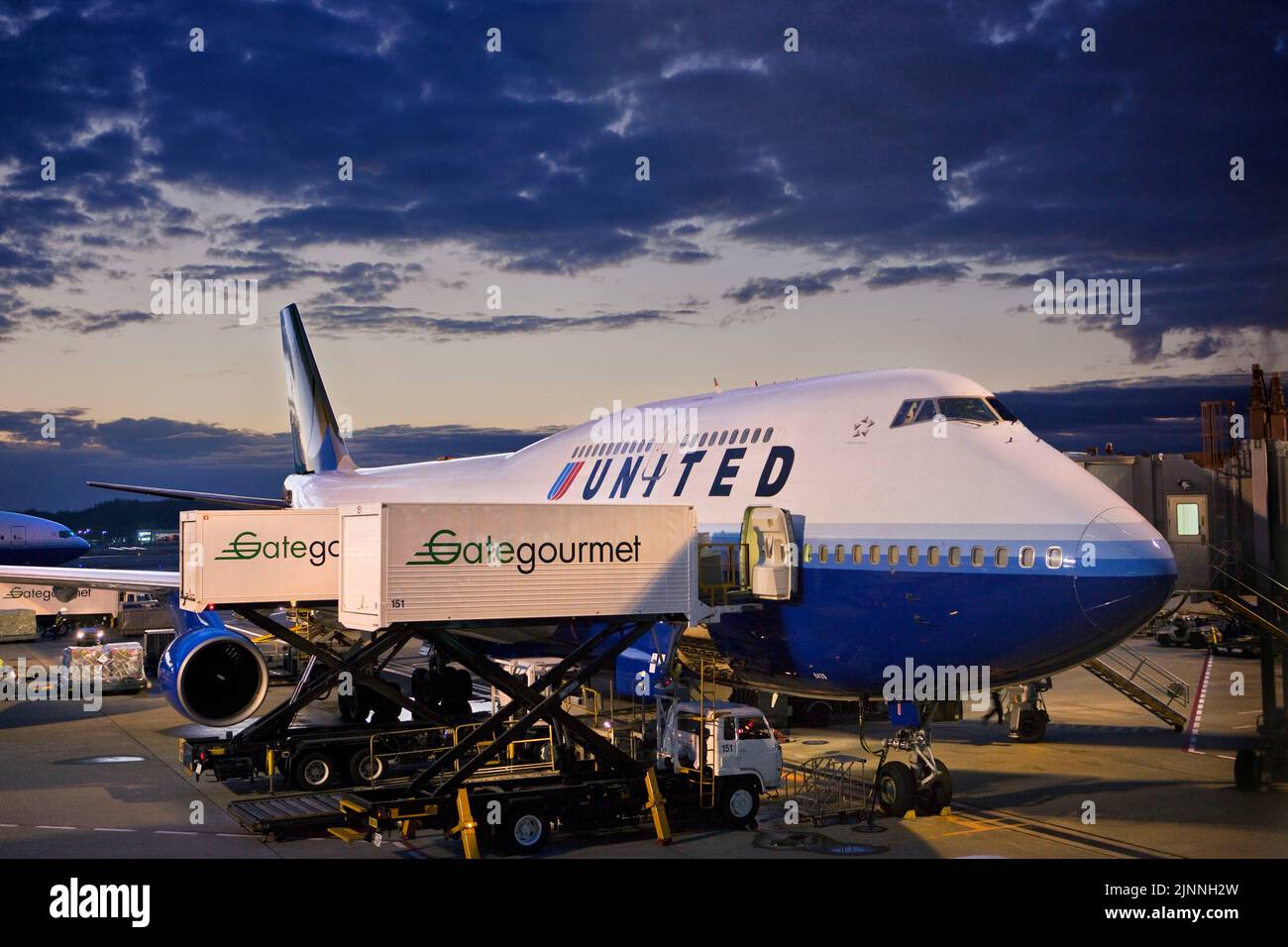 Loading jetliner hi-res stock photography and images - Alamy
