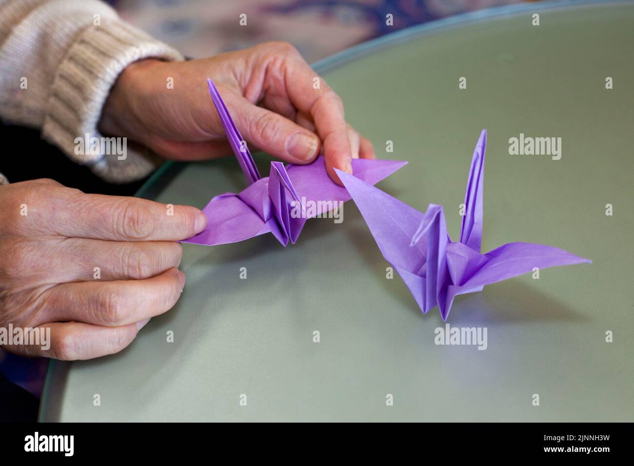 Making folded paper crane origami Ikaho Japan 2 Stock Photo - Alamy