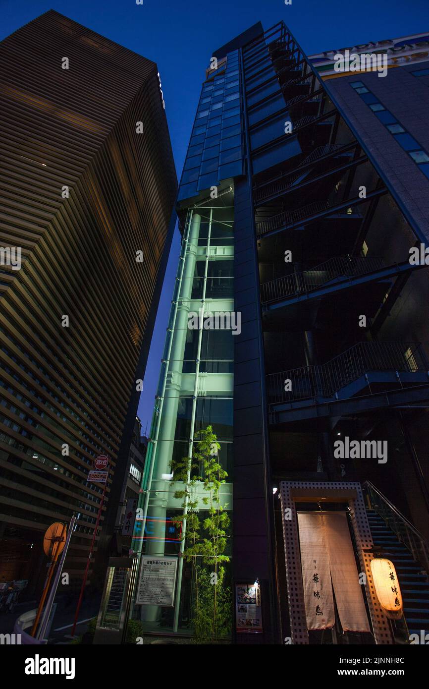 Modern architecture in the evening in Ginza, Tokyo, Japan Stock Photo ...