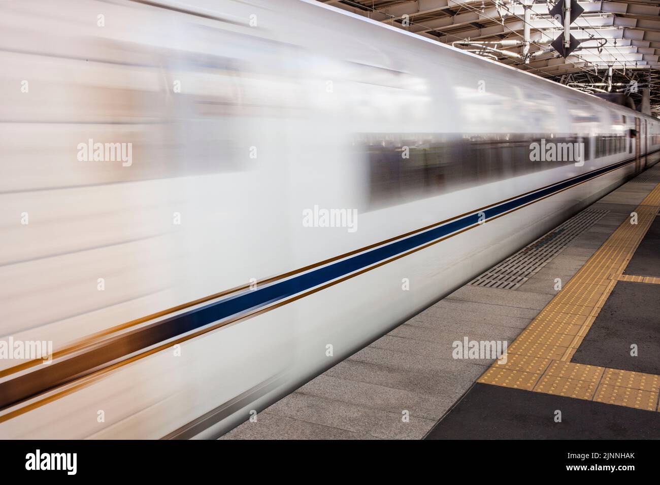 Motion blur leaving shinkansen hi-res stock photography and images - Alamy