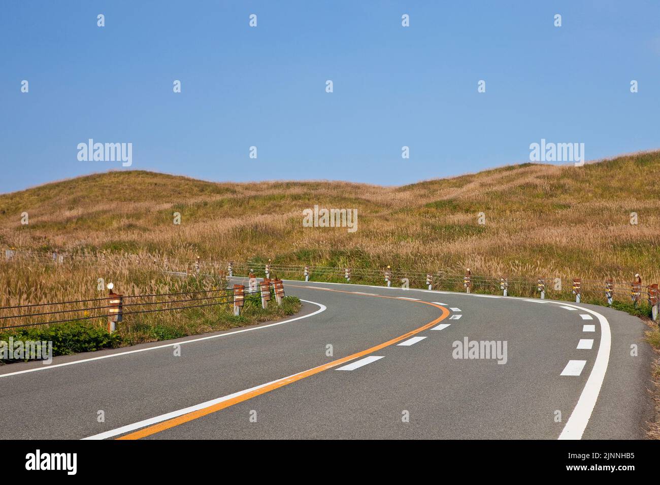 Mountain road near Mt. Aso in Kumamoto, Japan Stock Photo - Alamy