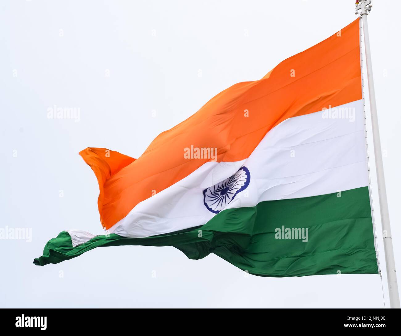 India flag flying high at Connaught Place with pride in blue sky, India ...