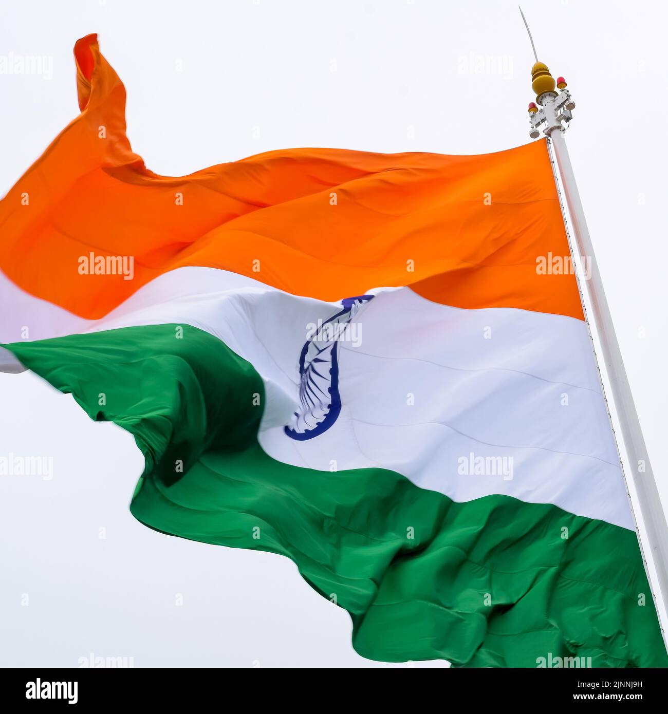 India flag flying high at Connaught Place with pride in blue sky, India ...
