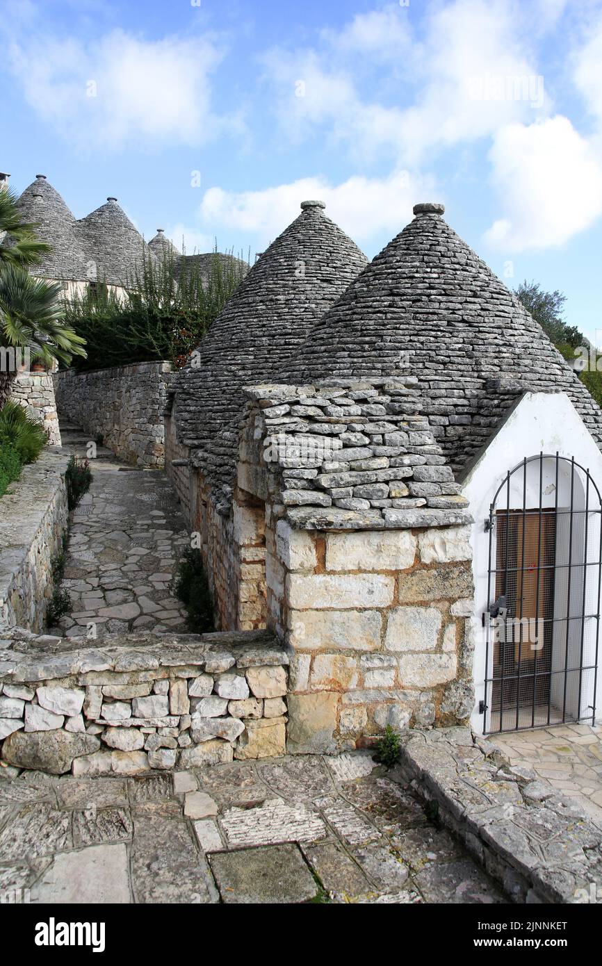 A Trulli village with a lot of traditional stone houses in Alberrobello ...