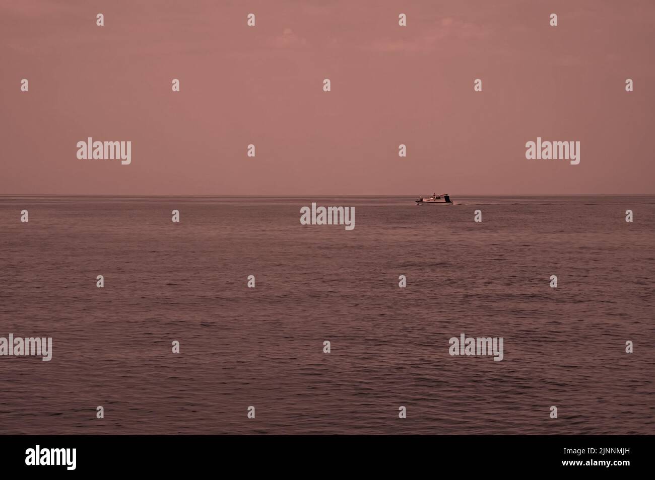 Distant sail boat hi-res stock photography and images - Alamy