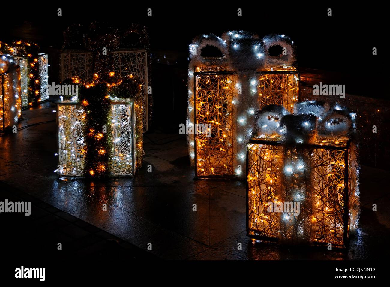 Gift boxes made of street lights at night in Kyiv Ukraine Stock Photo ...